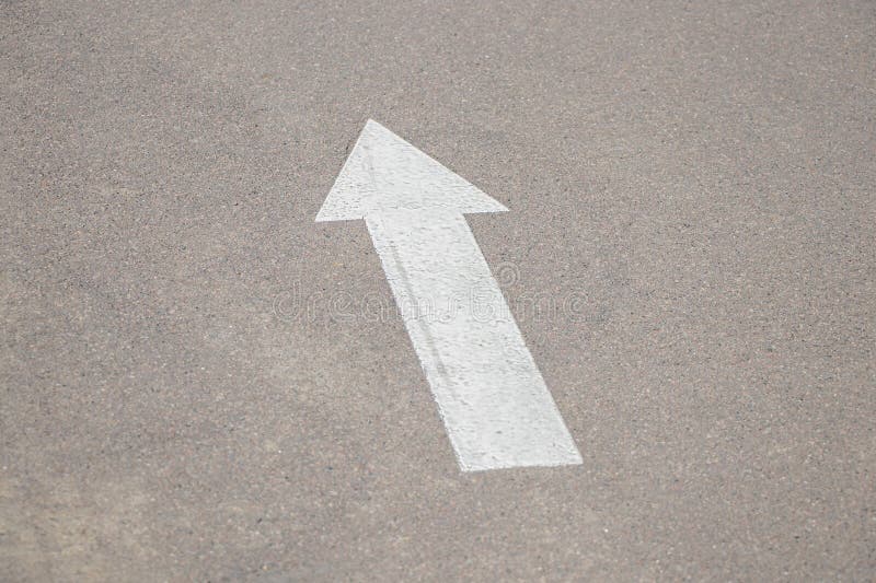 A White Arrow Pointing Forward is Drawn on the Asphalt on the Road As a ...