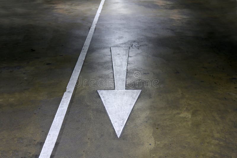 White Arrow Symbol Sign on Cement Floor Walkway Parking Stock Photo ...