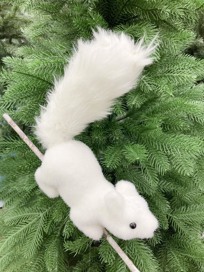 White Artificial Toy Squirrel on the Christmas Tree Stock Photo - Image ...