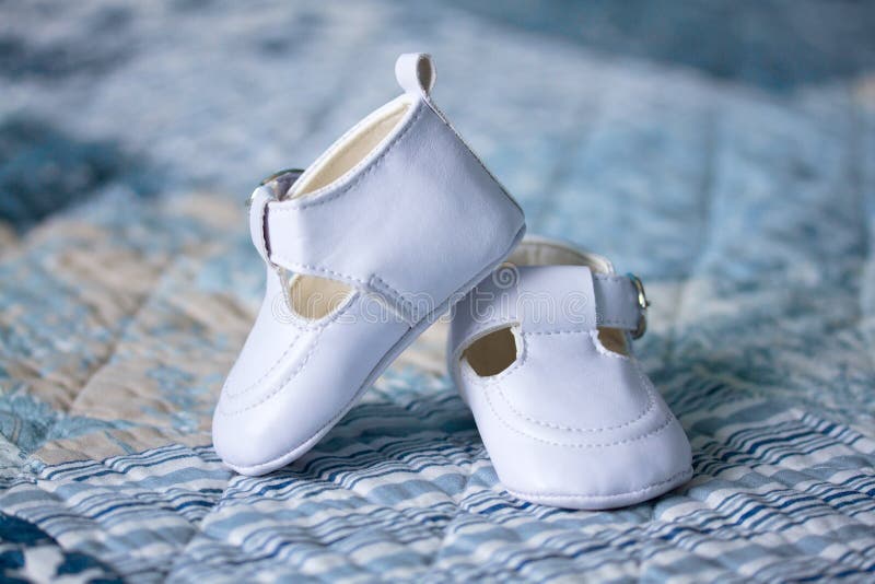 White baby shoes stock photo. Image of duvet, baby, patchwork - 77342044