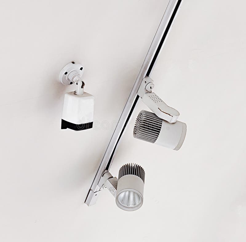 A White Backdrop with a White LED Spot Ceiling Light and LED Downlight ...