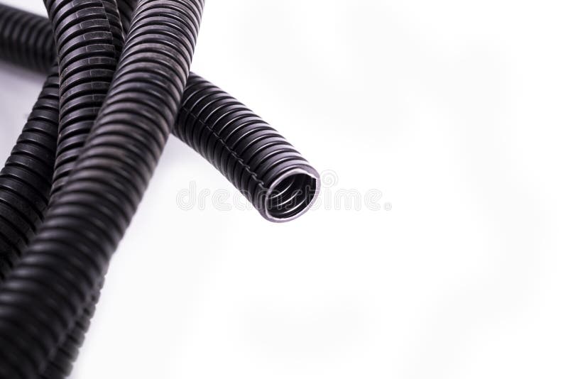 On a White Background. Black Corrugated Tube for Laying Cable in the ...