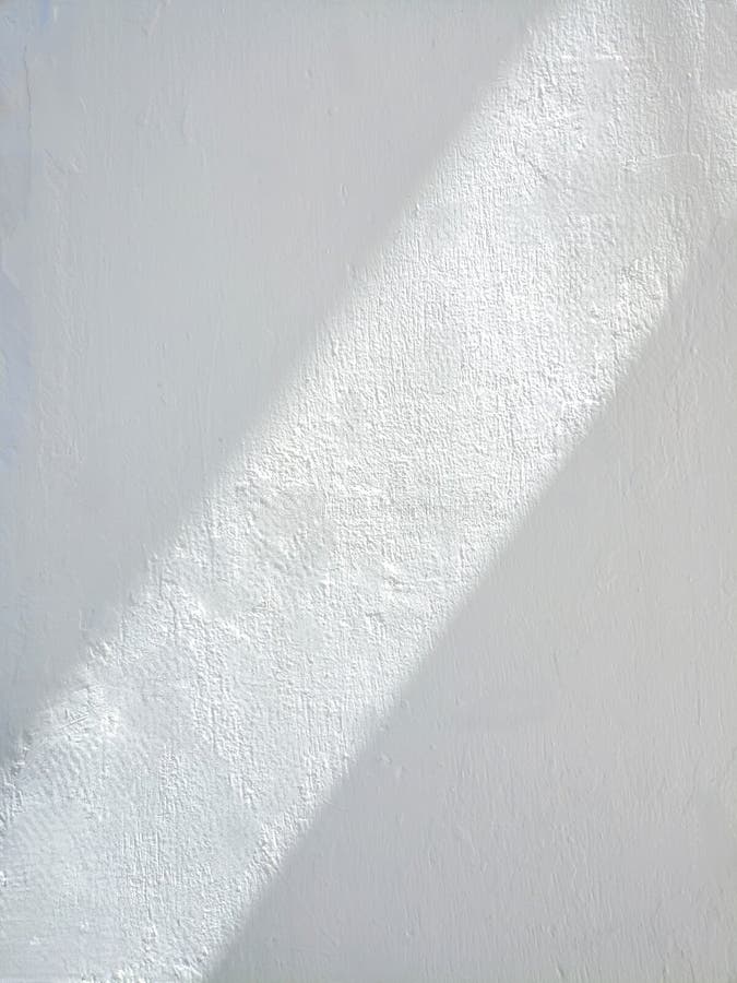 A White Background from a Concrete Wall with Light and Shadows ...