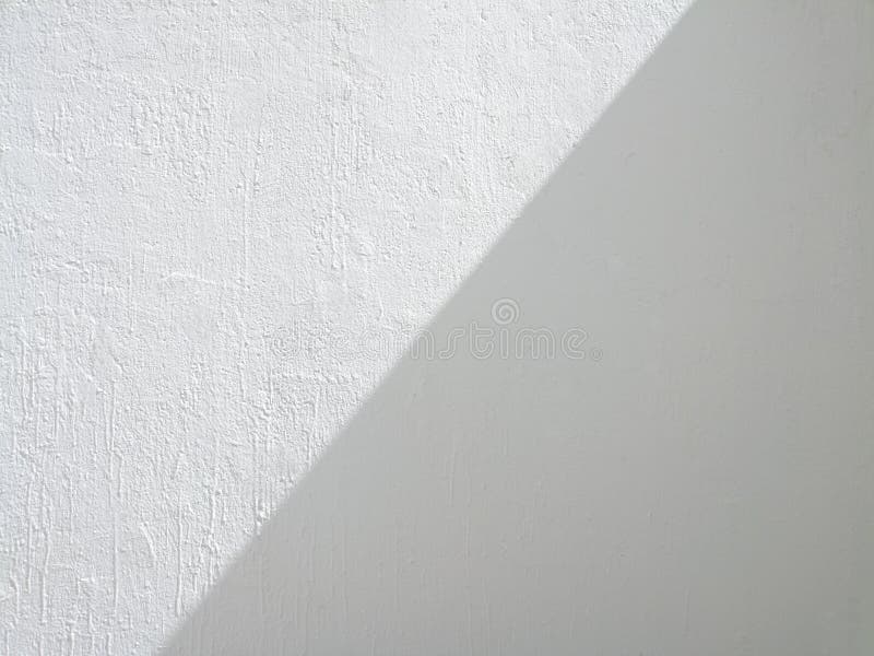 A White Background from a Concrete Wall with Light and Shadows ...