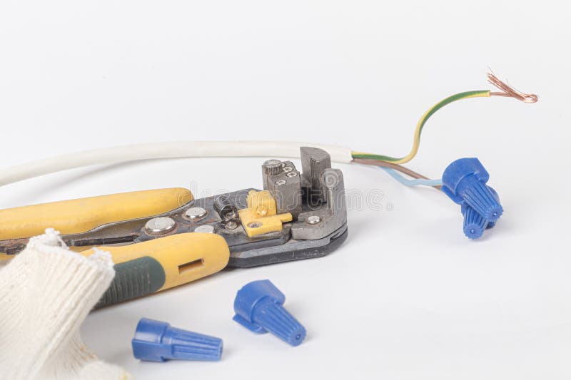 White Background. Electrical Wires. the Master Removes the Insulation ...