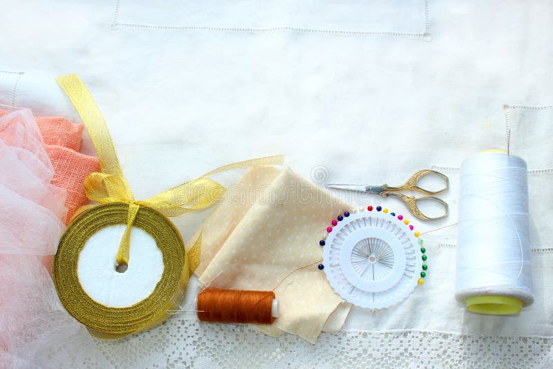 On a White Background, Pieces of Fabric, Sewing Thread, Needles ...