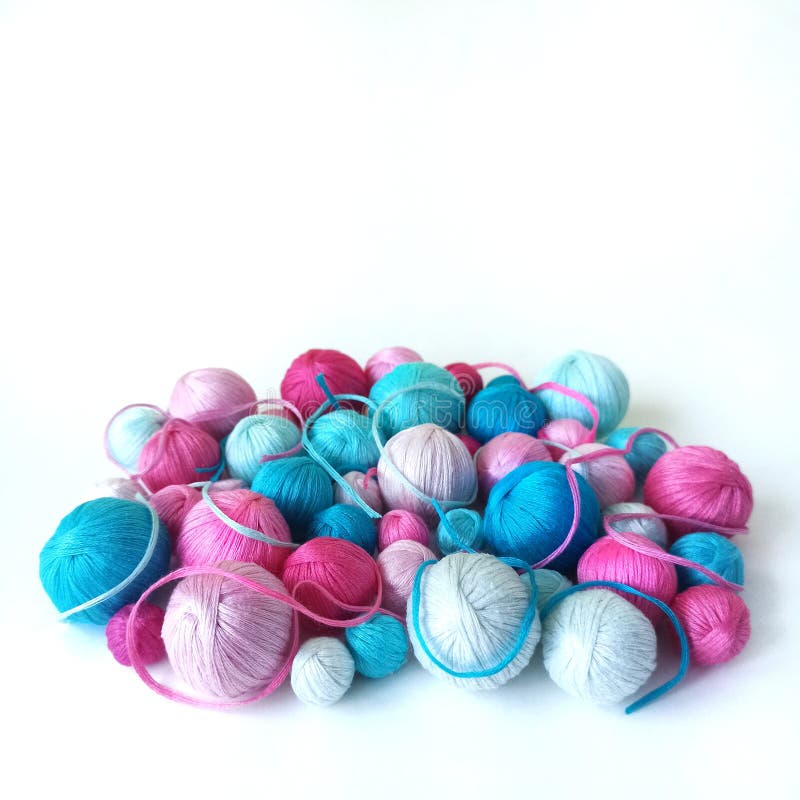 White Background. Pink and Blue Thread, Balls of Yarn. Stock Photo ...