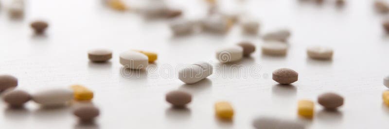White Background with Randomly Scattered Tablets. Stock Image - Image ...