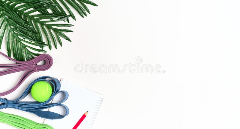 White Background and Resistance Loop for Exercise, Notebook for Workout ...