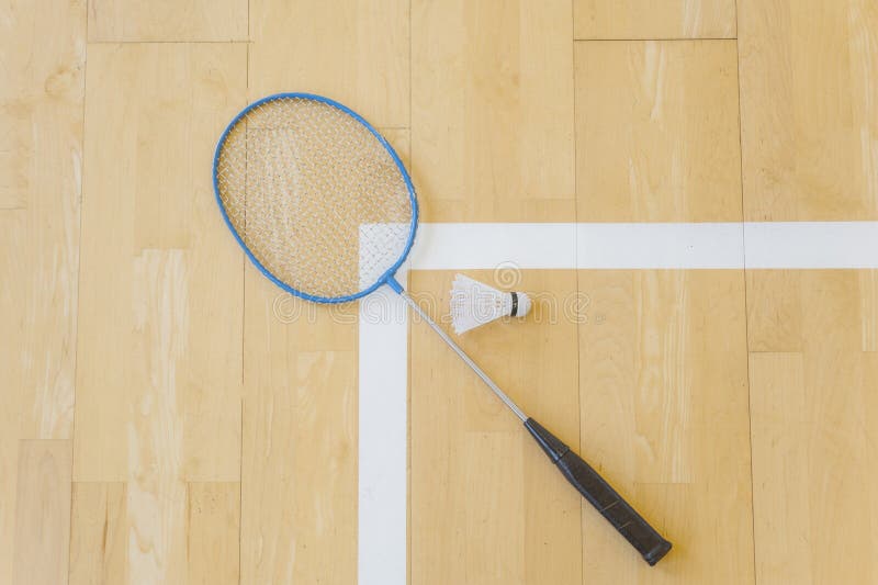 White Badminton Shuttlecock on a Hall Floor at Badminton Courts .Close ...