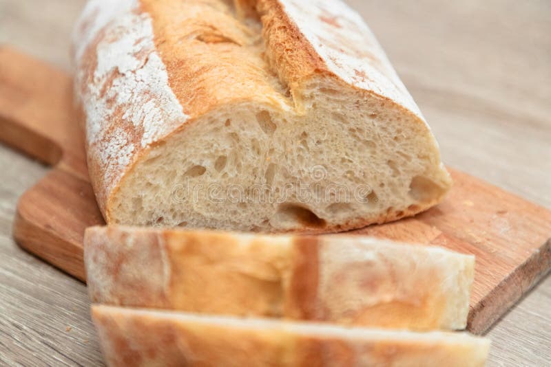White Baked Bread and Chopped Pieces Stock Photo - Image of bread ...