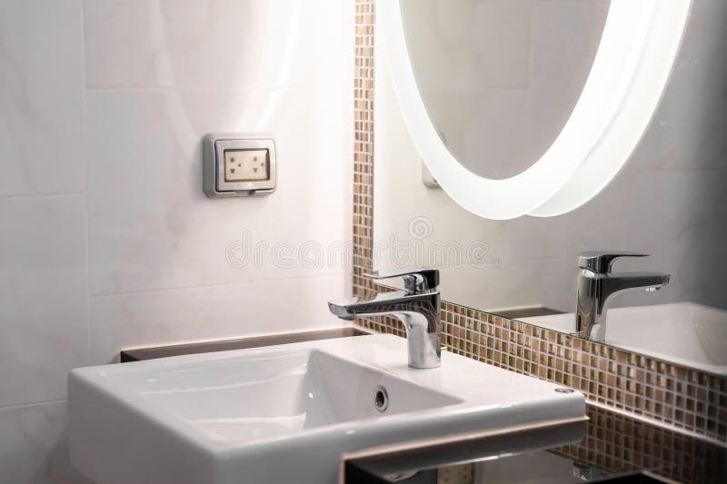 White Basin with Mirror Light in Bathroom Stock Image - Image of ...