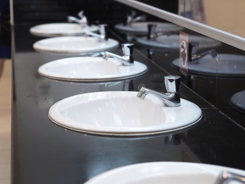 White Basin at Public Toilet Stock Photo - Image of style, water: 134654266
