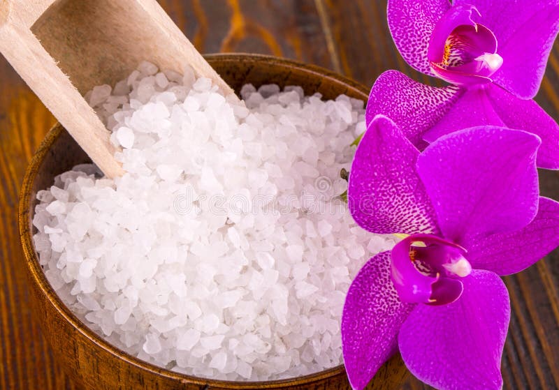 White Bath Salt and a Bag with Orhid on Wooden Surface. Stock Photo ...