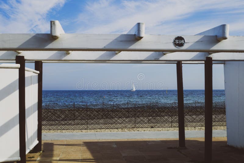 White Beach Buildings with Seascape in the Background Stock Photo ...