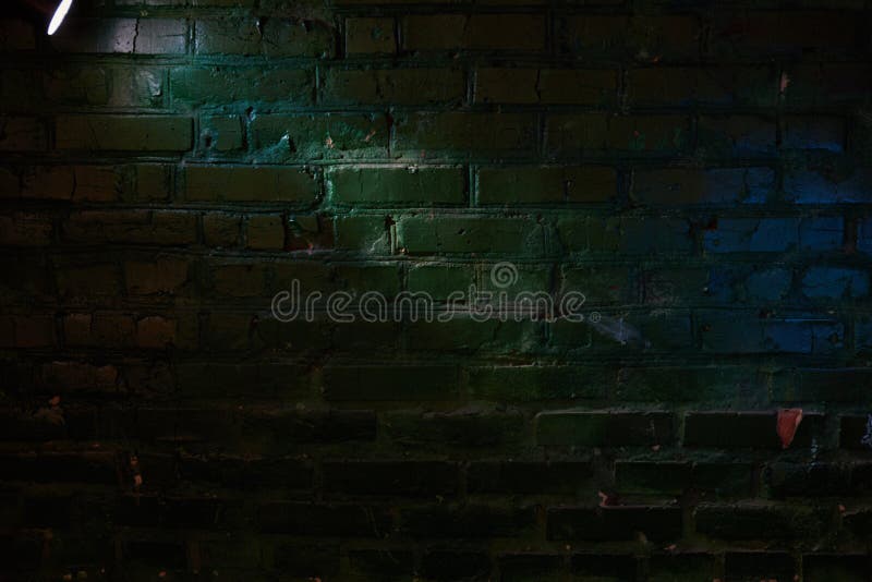 White Beam of a Lantern on a Green Brick Wall Stock Image - Image of ...