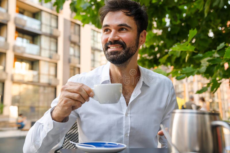 White Bearded Man Drinking Tea while Sitting at Cafe Stock Image ...