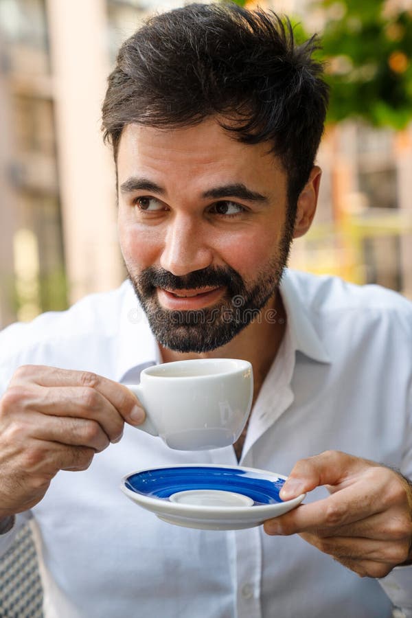 White Bearded Man Drinking Tea while Sitting at Cafe Stock Image ...