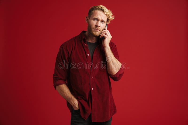 White Bearded Man Frowning while Talking on Mobile Phone Stock Image ...