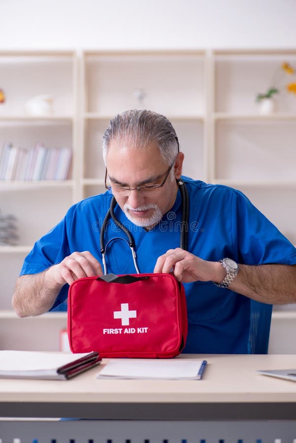 The White Bearded Old Doctor Working in Clinic Stock Image - Image of ...