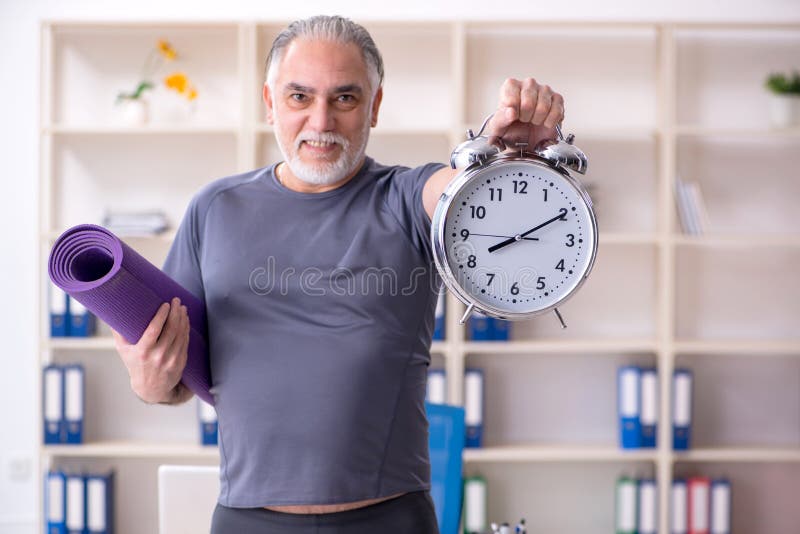 The White Bearded Old Man Employee Doing Exercises In The Office Stock Image Image Of Health