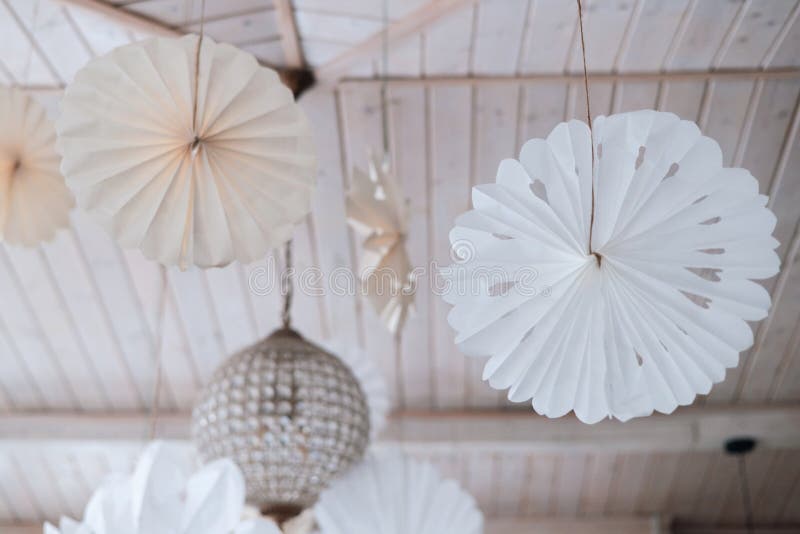 White and Beige Round Paper Handmade Decorations on the Ceiling ...