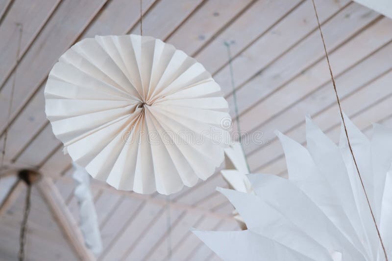 White and Beige Round Paper Handmade Decorations on the Ceiling ...