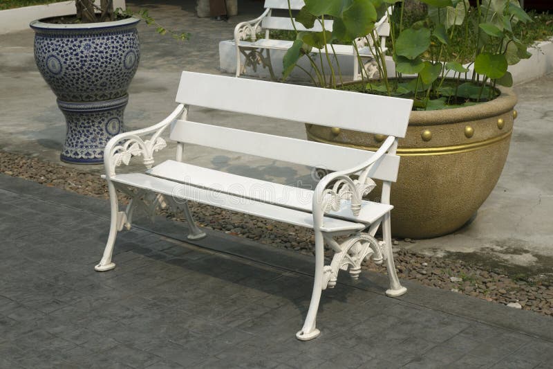 A White Bench in the Park for Sitting and Relaxing Stock Photo - Image ...