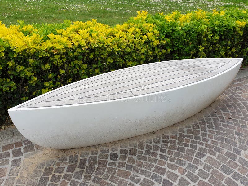 White Bench Unusual Shape in the Form of a Boat in the Park. Stock ...