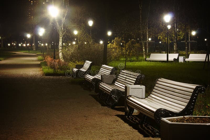 White Benches in the Park Night Time. with Vignette and Glow. Stock ...