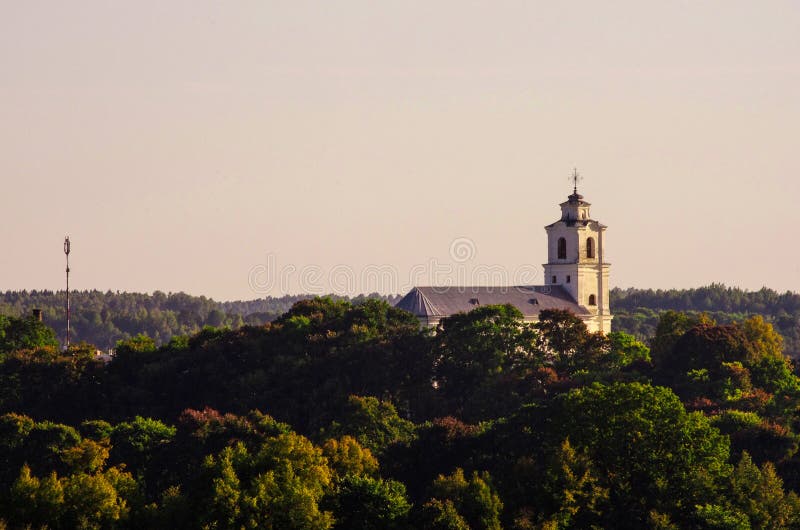 A White Big Church on a Hill between Trees Stock Photo - Image of tower ...