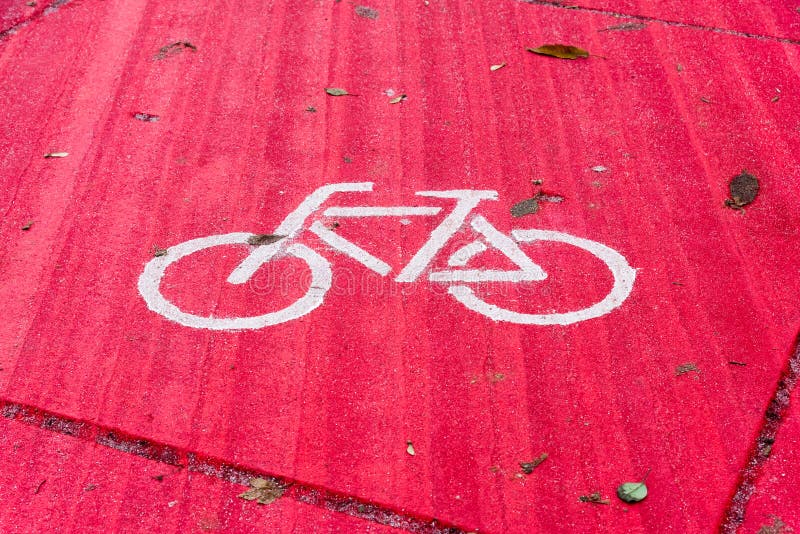 White Bike Sign on a Red Cobbled Floor Stock Photo - Image of health ...