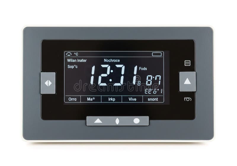 A White and Black Digital Clock with the Time of 18:07 on the Screen ...