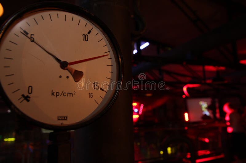 A White and Black Gauge with a Red Hand on it Stock Image - Image of ...