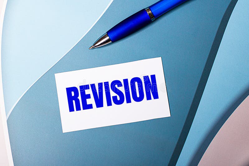 White Blank Card with REVISION Text and Blue Pen on Blue, Cyan and Pink ...