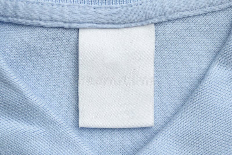 Blank Laundry Care Clothes Label on Fabric Texture Background Stock ...