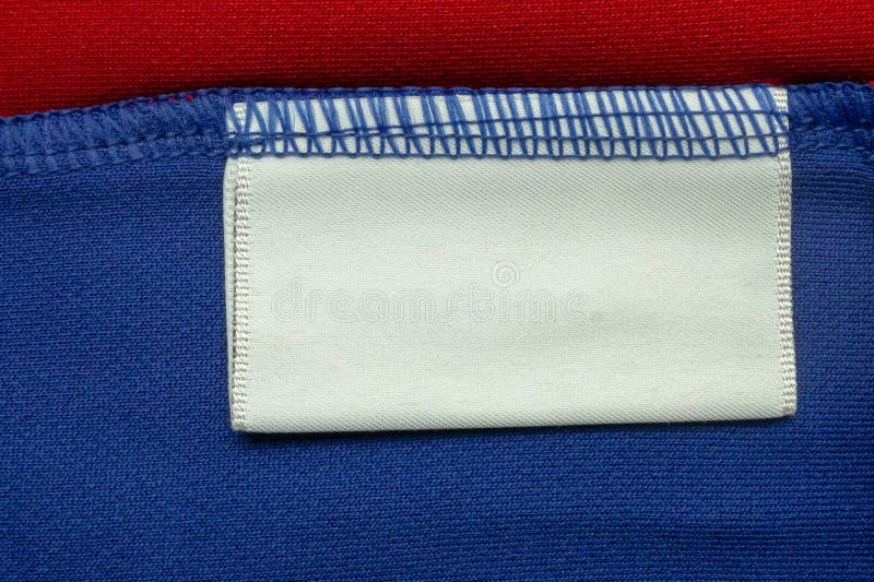 Blank Laundry Care Clothes Label on Blue Shirt Fabric Background Stock ...