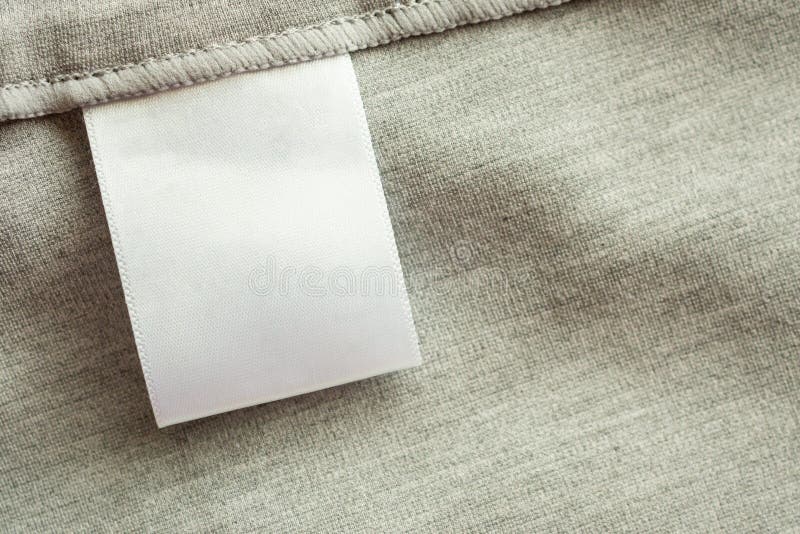 White Blank Laundry Care Clothing Label on Gray Fabric Texture ...