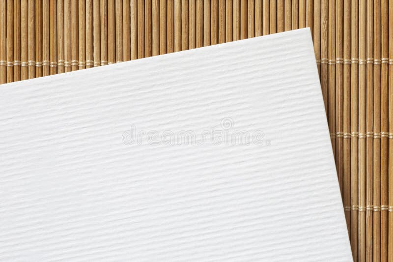 White Blank Sheet of Paper Laying on Bamboo Mat Stock Image - Image of ...