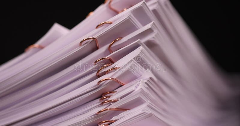 White Blank Sheets of Paper Connected by Copper Staples Stock Video ...