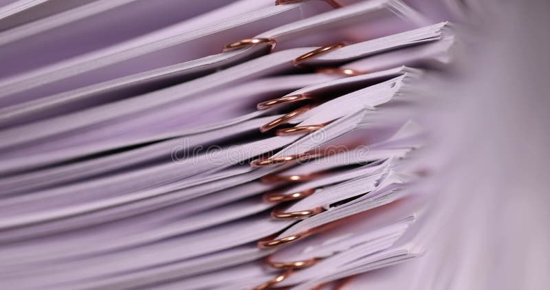 White Blank Sheets of Paper Connected by Copper Staples Stock Video ...