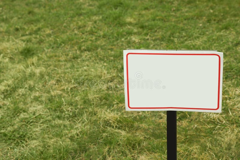 White Blank Signboard on Green Grass. Space for Text Stock Image ...