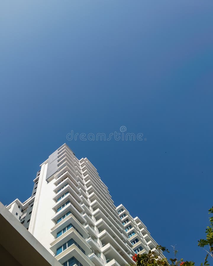 White and Blue Building Exterior. Low Angle View of Modern Building ...