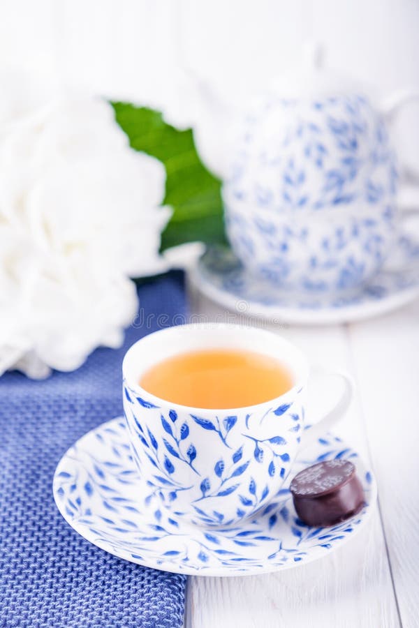 White Blue Cup of Green Tea and White Hydrangea, Beautiful Porcelain ...