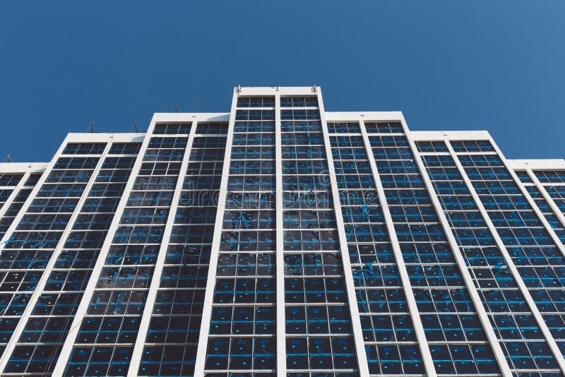 White And Blue High Rise Building Under Blue Sky During Daytime Stock ...