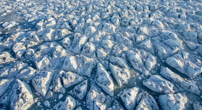 White and Blue Icy Surface Texture of a Frozen Glacier Stock ...