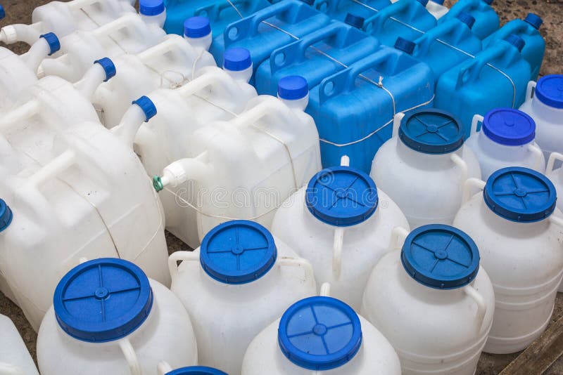 Plastic gas cans stock photo. Image of blue, closeup - 30246410