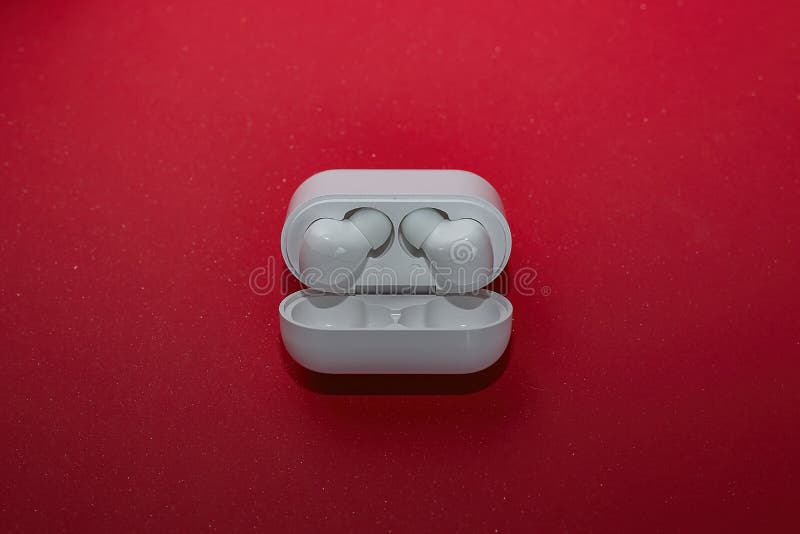 White Bluetooth Wireless Headphones on a Red Background Stock Photo ...
