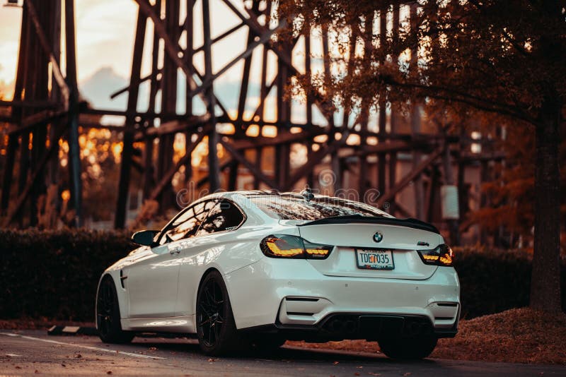White BMW M4 Parked in Front of a Bridge Editorial Stock Image - Image ...