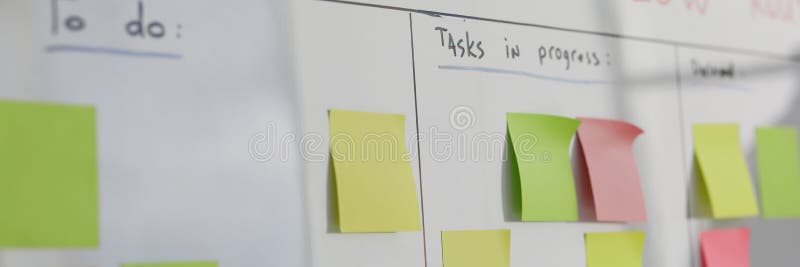 On White Board Multicolored Stickers with Business Tasks are Glued ...
